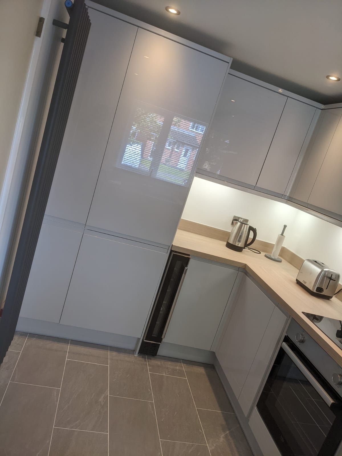 Handless kitchen with light oak worktops - | Kitchens | Bathrooms ...